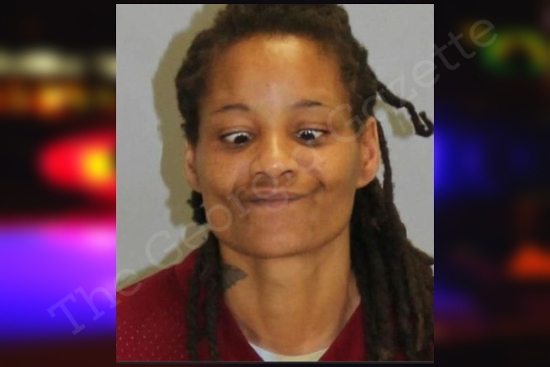 Woman stabs 3, including police officer, cab driver at Atlanta airport ...